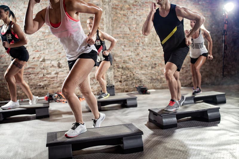 Group training on steppers stock photo. Image of exercise - 78699814