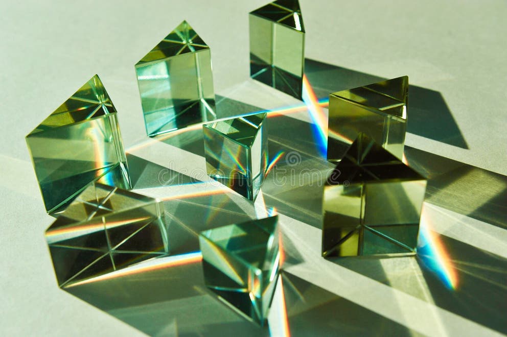 Group of Triangular Clear Prism Refracts and Reflects the Light in ...