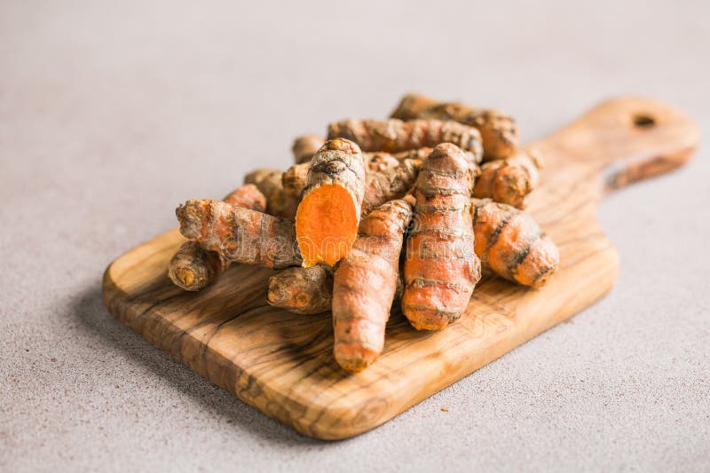 Group of turmeric roots stock image. Image of yellow - 306318787