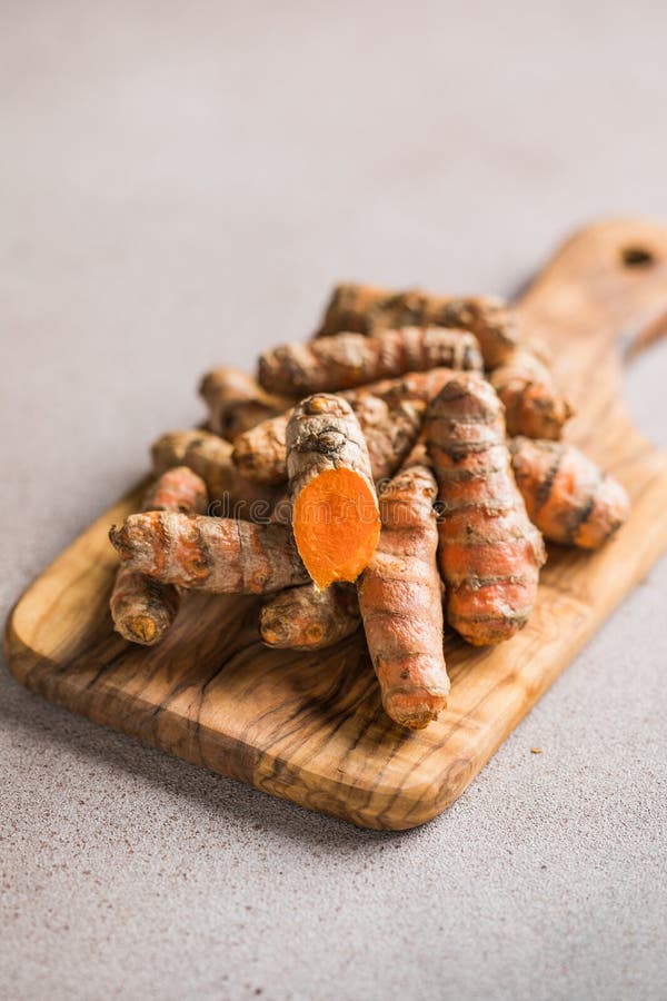 Group of turmeric roots stock photo. Image of aroma - 306318794