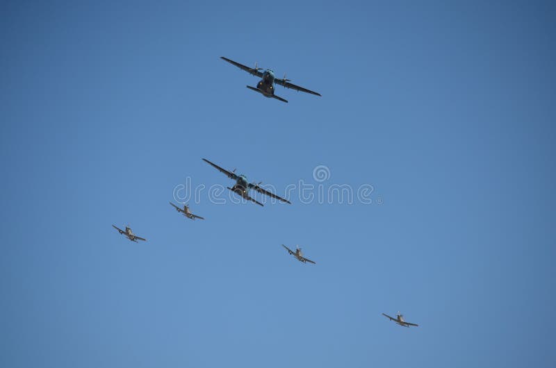 A Group of Two Fixed Wing Aircrafts and Four Gray Fighter Aircrafts ...
