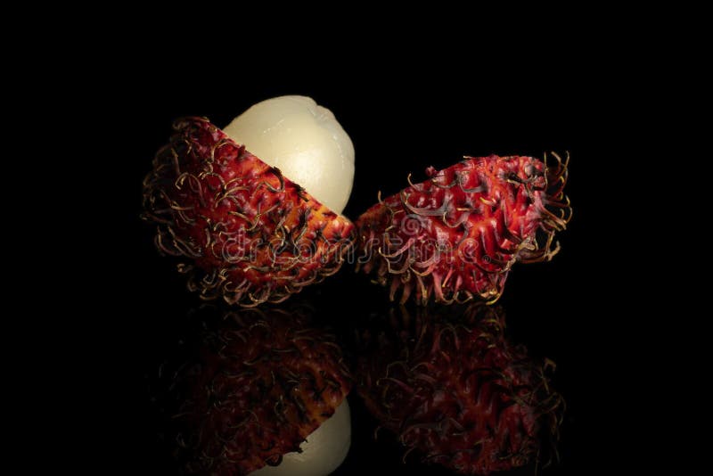 Fresh Red Rambutan on Black Glass Stock Image - Image of group, black ...
