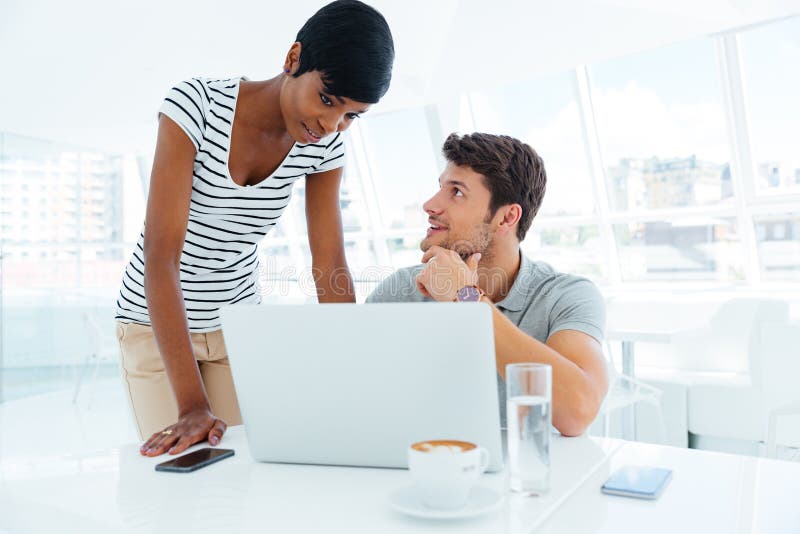 Group of Two Young Businesspeople Working Together in Conference Room ...