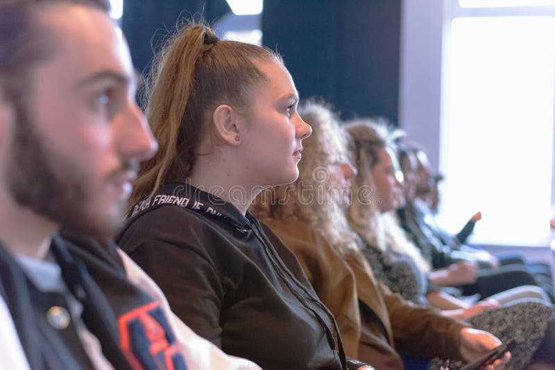 Group of University Multiethnic Students Listening Presentation from ...