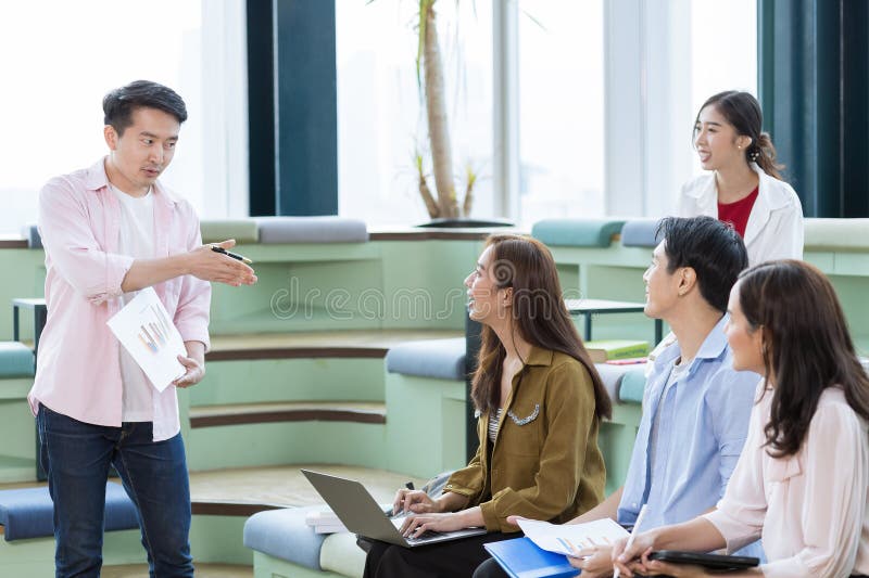 Group of University Students Attending Lecture on Campus. Meeting Room ... Group of University Students Attending Lecture on Campus. Meeting Room ...