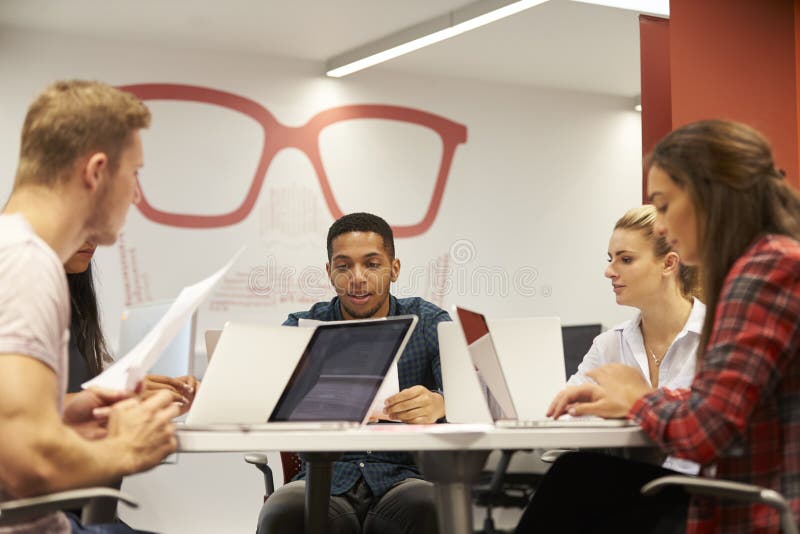 Group of University Students Collaborating on Project Stock Image ...