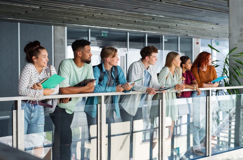 Group of University Students Standing Indoors, Back To School Concept ...