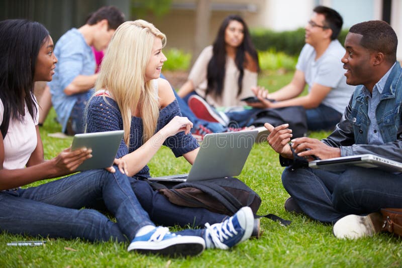 Group of University Students Working Outside Together Stock Photo ...