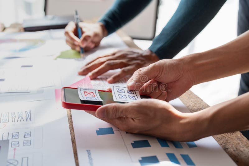 Group of Ux Developer and Ui Designer Brainstorming about App Interface ...