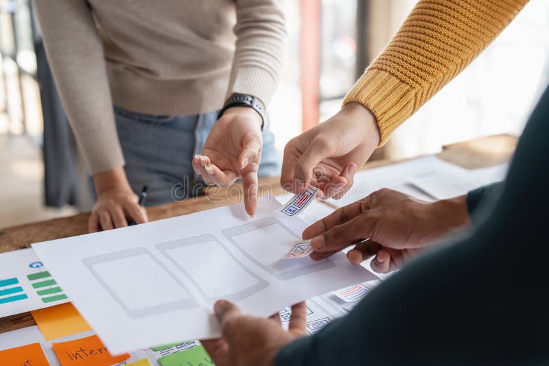 Asian Ux Developer and Ui Designer Team Stacking Hands Together ...