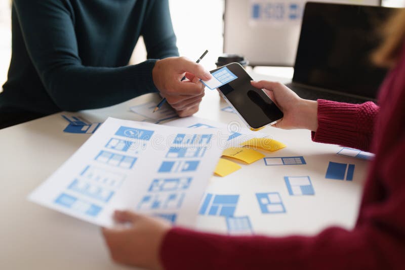 Group of Ux Developer and Ui Designer Brainstorming about App Interface ...