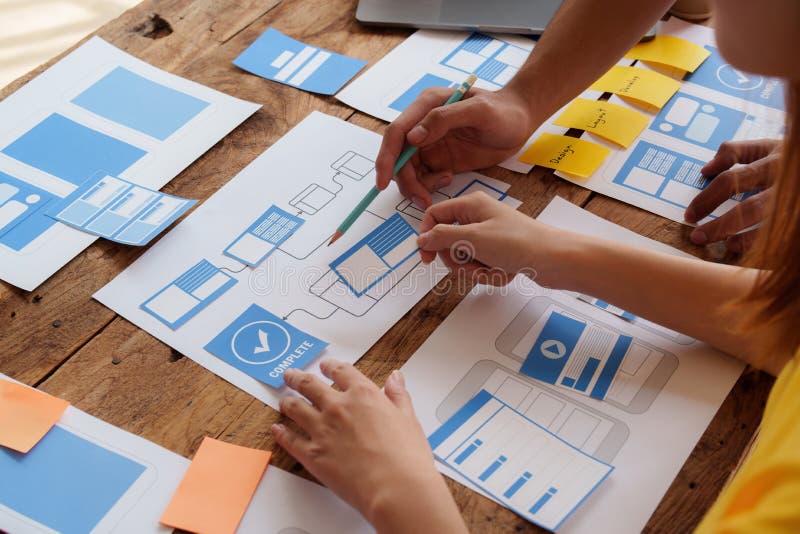 Group of Ux Developer and Ui Designer Brainstorming about App Interface ...