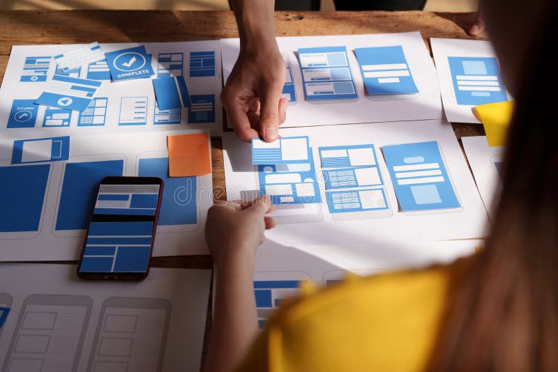 Group of Ux Developer and Ui Designer Brainstorming about App Interface ...