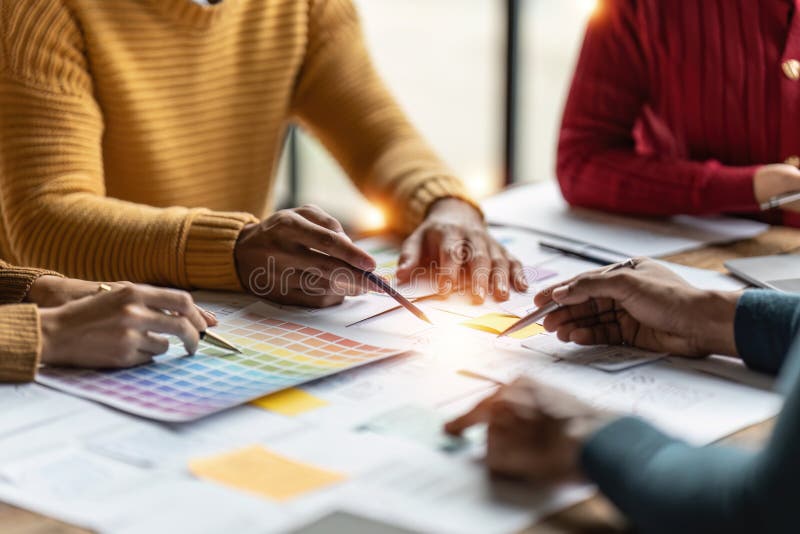 Group of Ux Developer and Ui Designer Brainstorming about App Interface ...