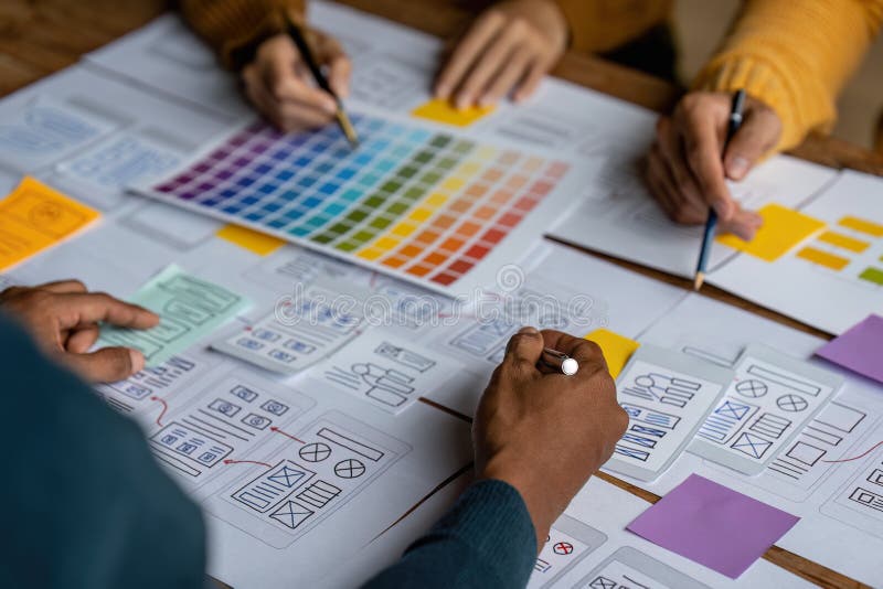 Group of Ux Developer and Ui Designer Brainstorming about App Interface ...