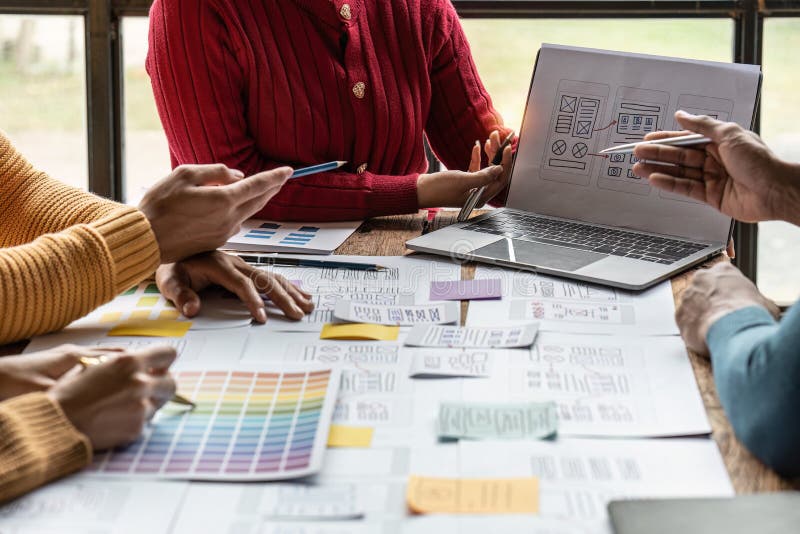 Group of Ux Developer and Ui Designer Brainstorming about App Interface ...