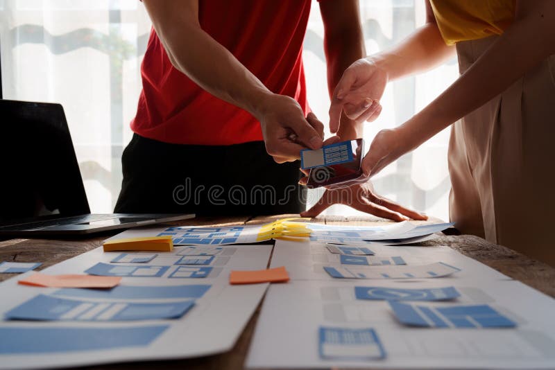 Group of Ux Developer and Ui Designer Brainstorming about App Interface ...