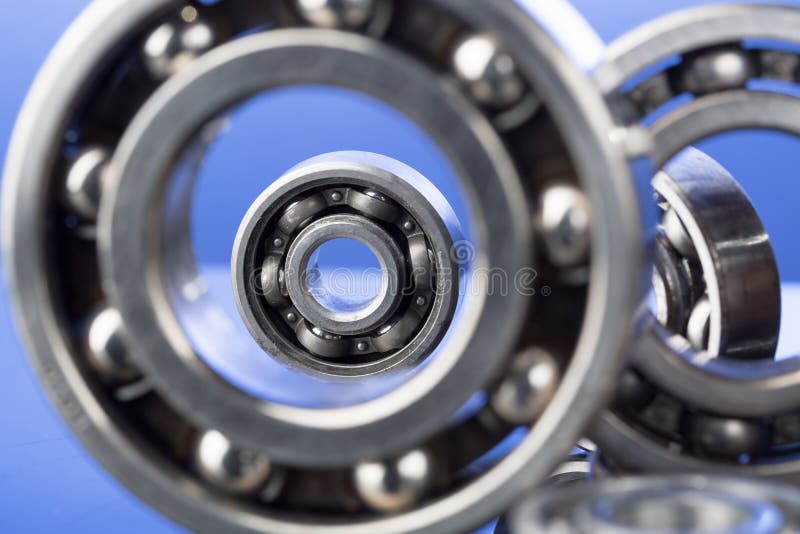Group of Various Ball Bearings Close Up on Nice Blue Background. Stock ...