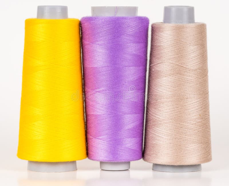 Vary colored thread coils stock image. Image of factory - 103283001