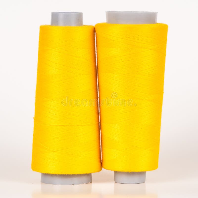 Vary colored thread coils stock photo. Image of multiple - 103282348