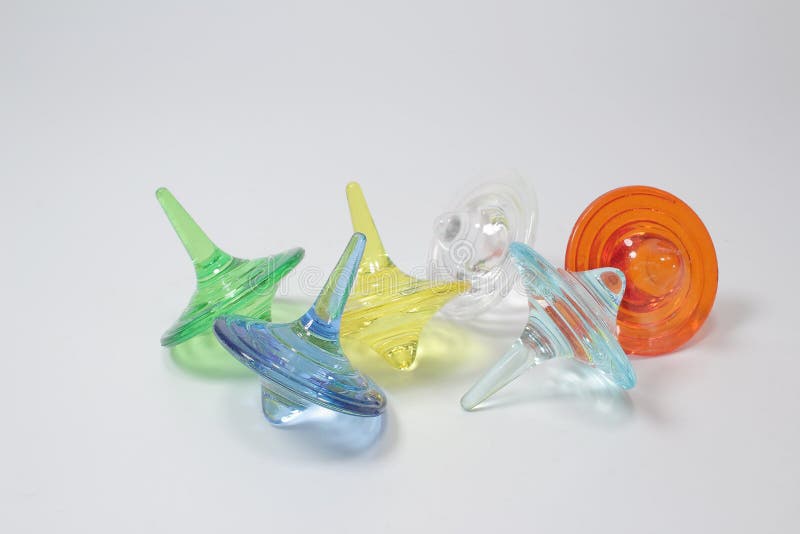 A Group of Vintage Toy Top Spinning in Motion Stock Photo - Image of ...