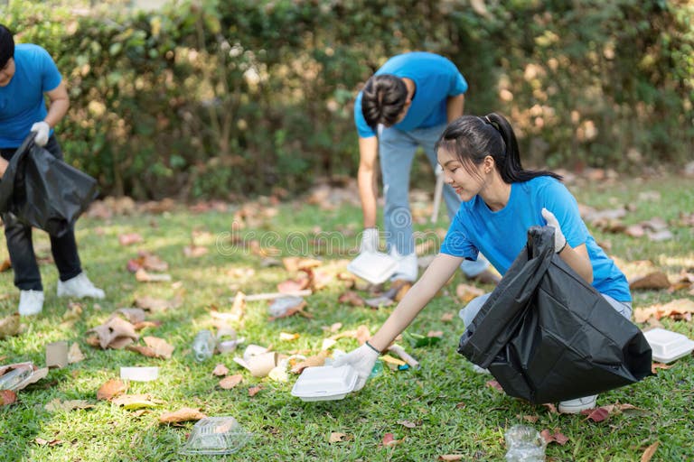 Group Activity. Diverse Volunteers Working Together in Park Cleanup ...