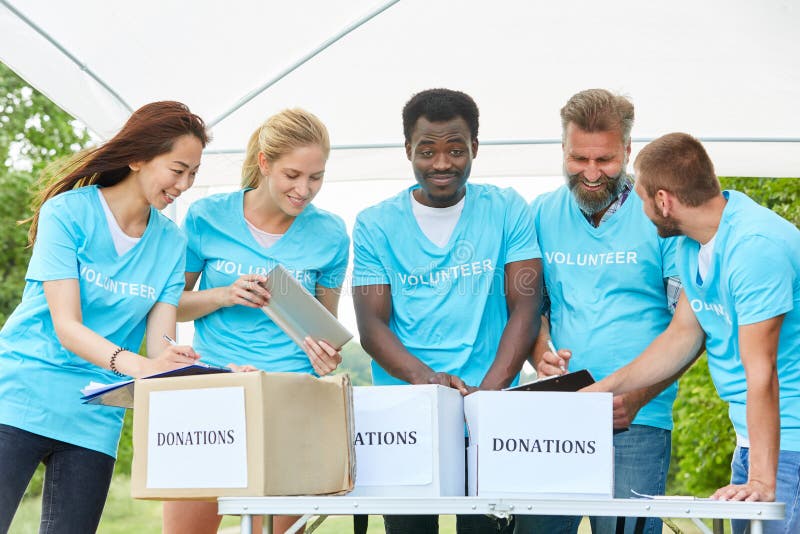 Group of Volunteers at the Fundraiser Stock Photo - Image of outside ...