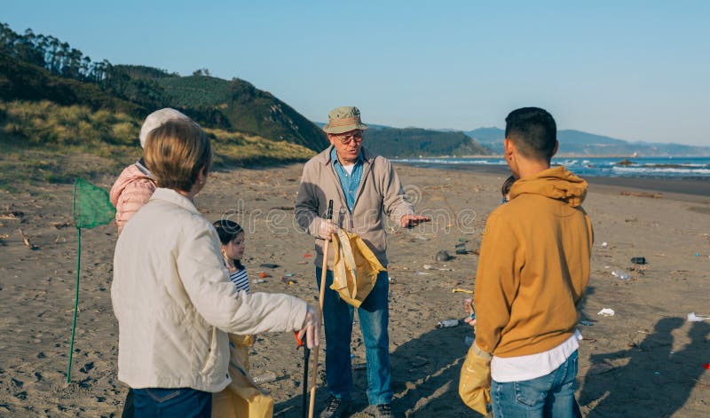 Volunteers Preparing To Clean the Beach Stock Image - Image of ...