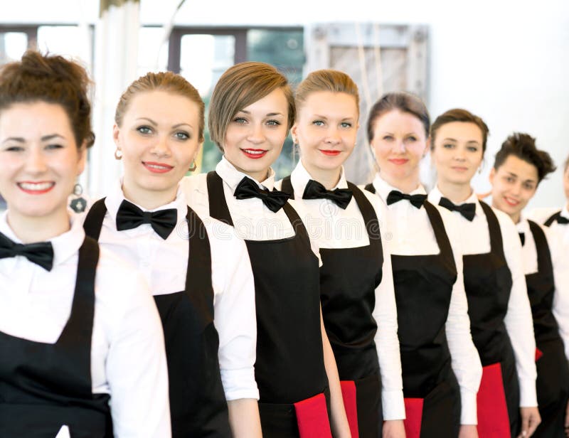 Group of Waiters at a Prestigious Restaurant Standing in the Col Stock ...