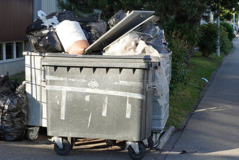 A Group of Waste Containers on Wheels. Stock Image - Image of garbage ...