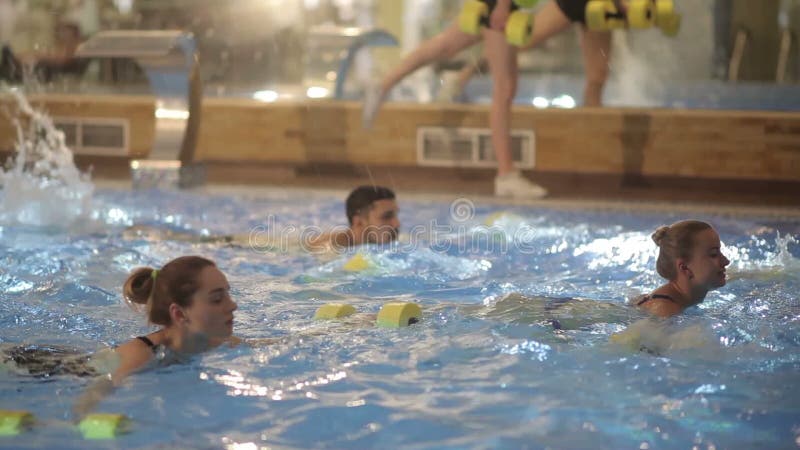 Group Water Aerobics Classes Stock Video - Video of blue, group: 69860677