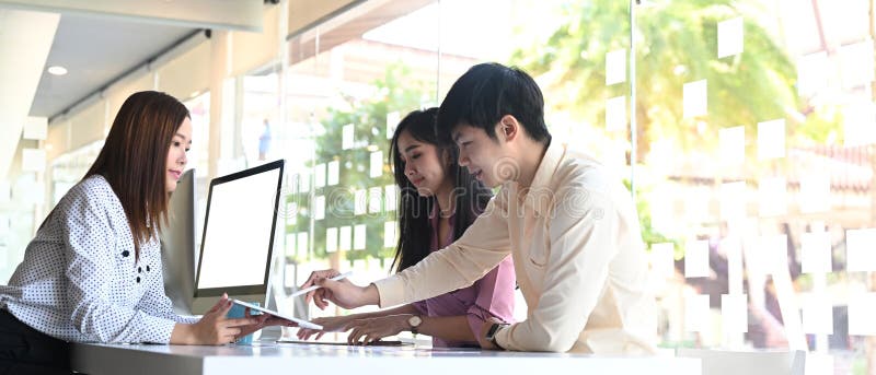 Group of Web Designers are Working Together To Develop a Mobile ...