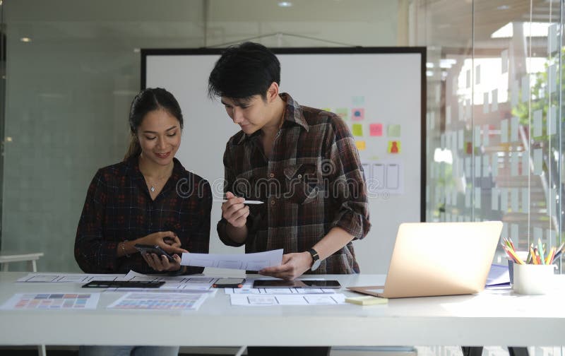 Group of Web Designers are Working Together To Develop Mobile ...