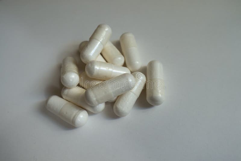 Group of White Capsules of Magnesium Stock Image - Image of additive ...