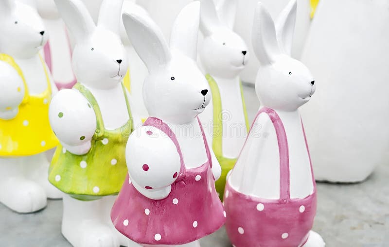 Group of White Ceramic Easter Bunnies Stock Photo - Image of pink ...