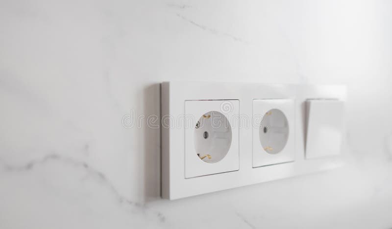 Group of White European Electrical Outlets and a Switch Stock Image ...