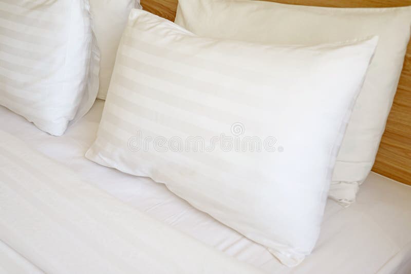 Group of White Pillows on the Bed for the Concept of QUALITY SLEEP ...