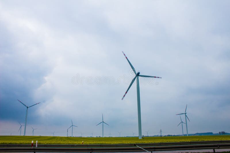 Group of Windmills for Renewable Electric Energy Production. Background ...