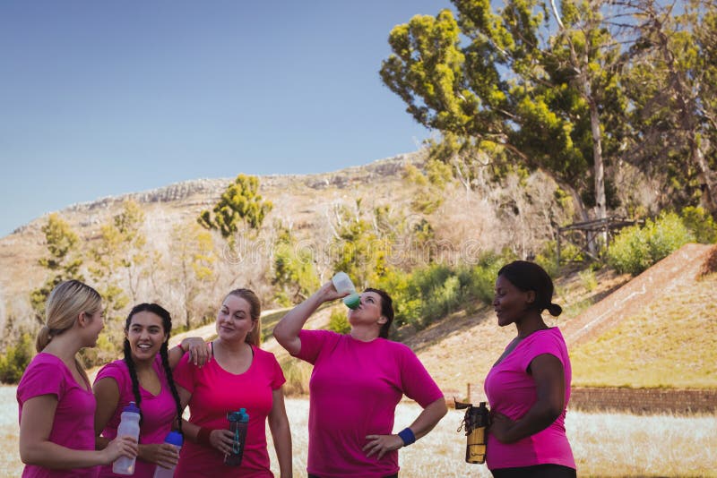 Group of Women Drinking Water in the Boot Camp Stock Image - Image of ...