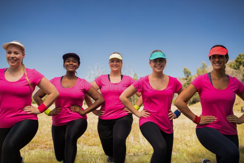 Group of Women Exercising Together in the Boot Camp Stock Image - Image ...
