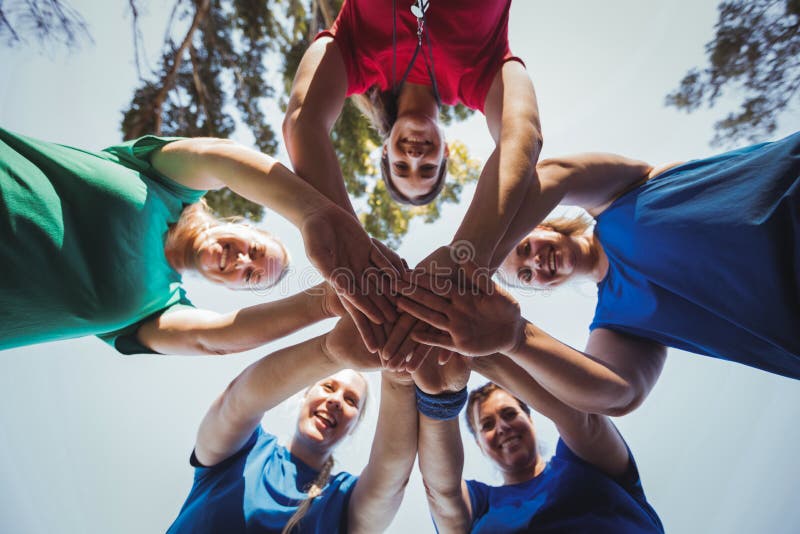Group of Women Forming Hand Stack in the Boot Camp Stock Photo - Image ...