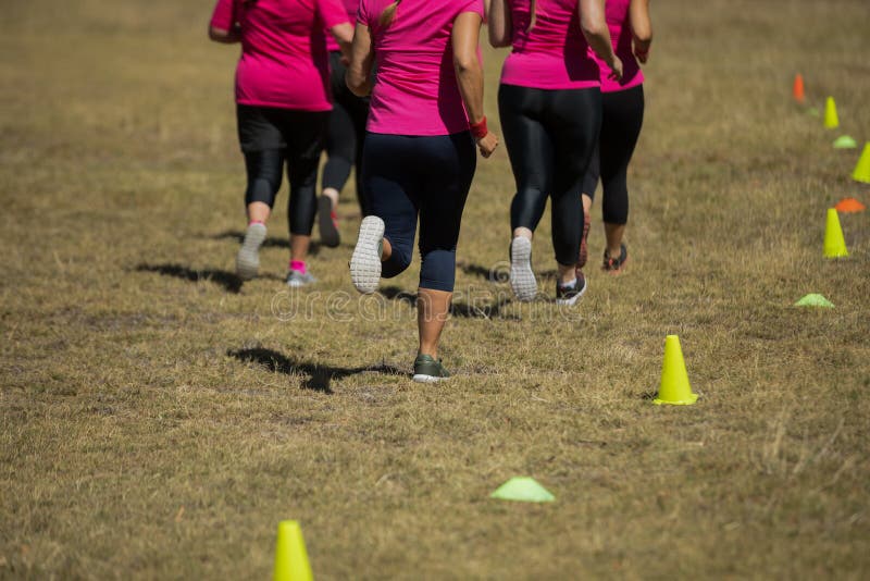 Group of Women Jogging Together in the Boot Camp Stock Photo - Image of ...