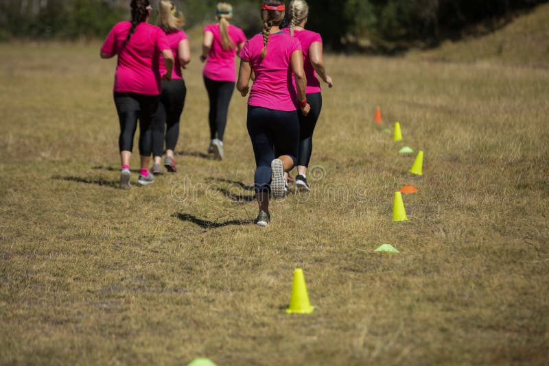 Group of Women Jogging Together in the Boot Camp Stock Image - Image of ...