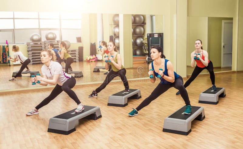 Group of Women Making Step Aerobics Stock Image - Image of exercise ...