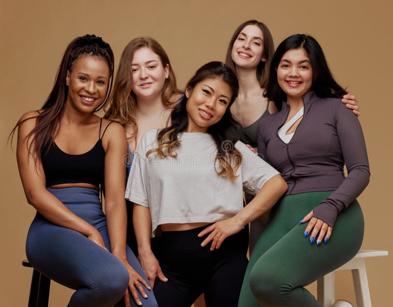 Group of Women, Representing Range of Body Types and Ethnicities Posing ...