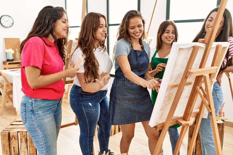Group of Women Smiling Happy and Looking Draw of Partner Standing at ...