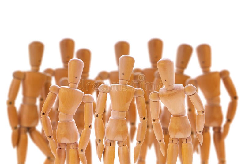 Group of Wooden Dummy Characters Standing Around One Stock Photo ...