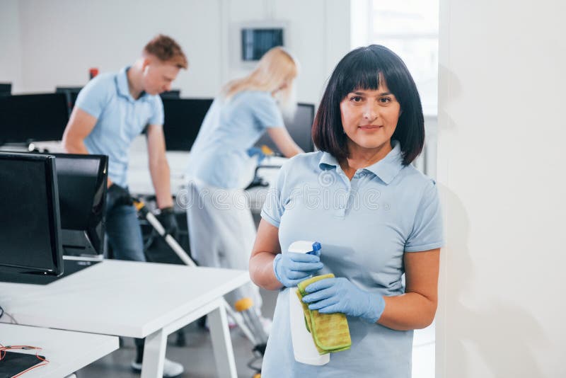 Group of Workers Clean Modern Office Together at Daytime Stock Image ...