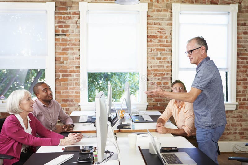 Group of Workers at Desks in Modern Design Office Stock Photo - Image ...