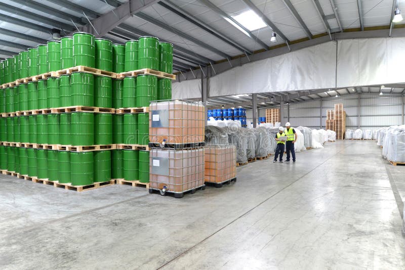 Group of Workers in the Logistics Industry Work in a Warehouse W Stock ...